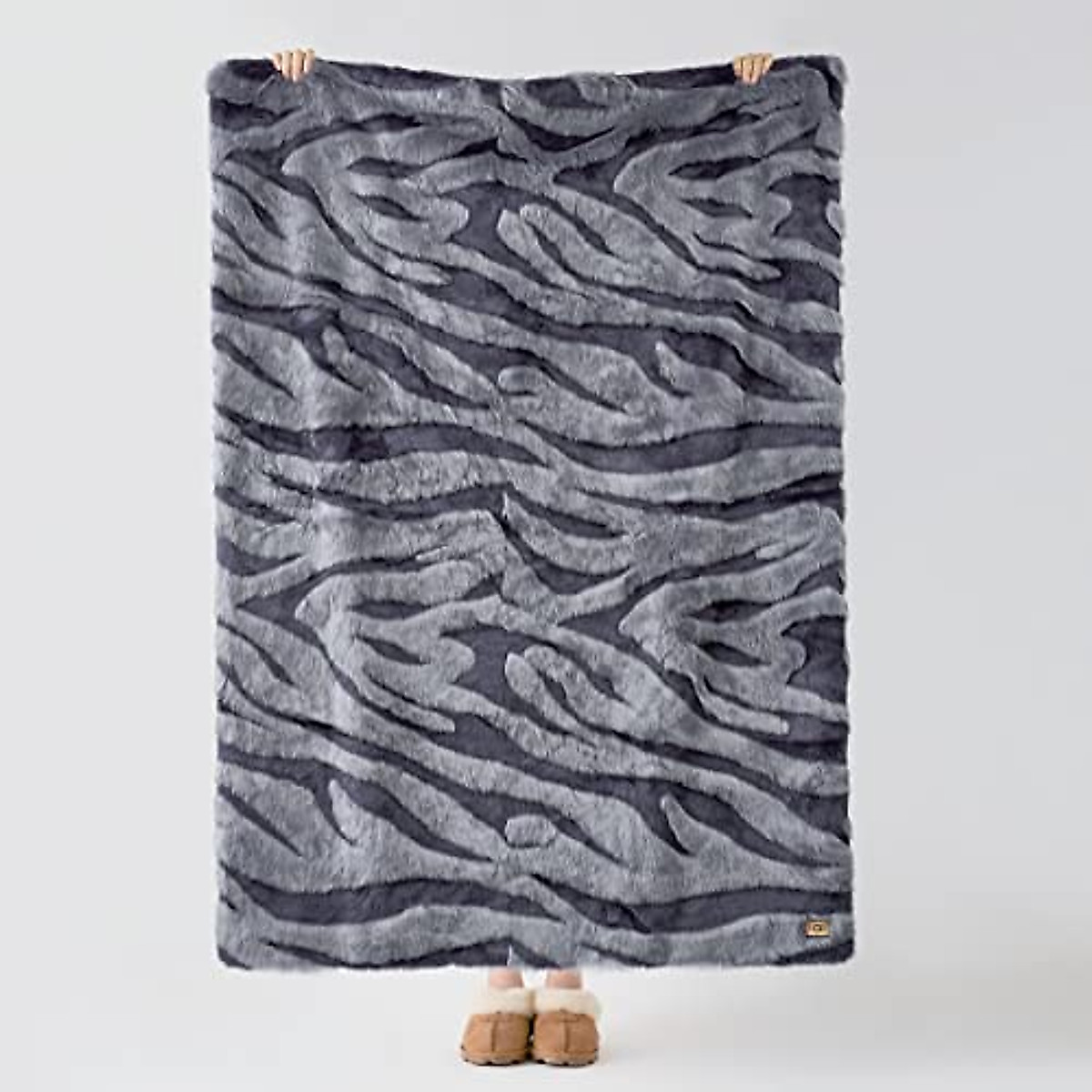 UGG Shayla Couch Throw – Carved Jacquard Faux Fur Textured Accent Blanket – Zebra Patterned – Cozy Home Décor – Soft, Plush, Luxurious Throw Blanket for Sofa or Bed - 50” x 70” - Space Age/Gravel