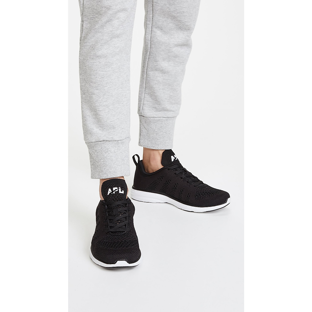 Athletic Propulsion Labs (APL) Women's Techloom Pro Sneaker, Black/White/Black, 6.5