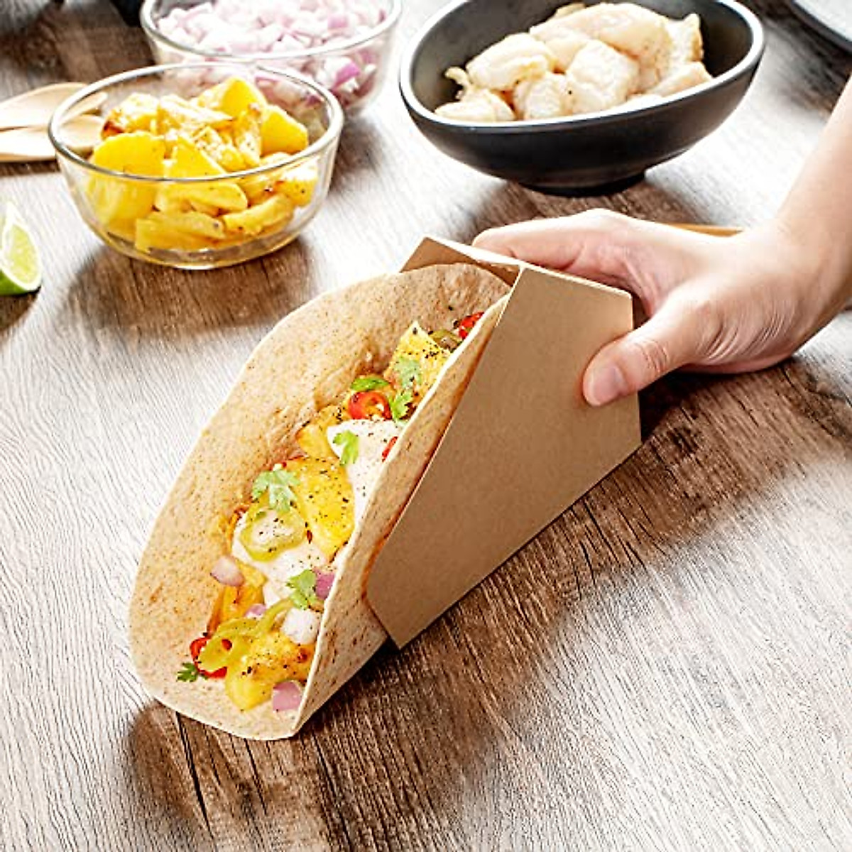 Restaurantware Bio Tek 6 .25 x 2 x 3.75 Inch Single Taco Holder 200 Greaseproof Stand Up Taco Holder - Large Self-Standing Kraft Paper Paper Taco Holder Freezable