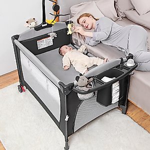 Mereryi Baby Bassinet 5-in-1 Pack and Play Portable Crib for Baby Bed,Multifunction Bedside Crib from Newborn to Toddlers,U-Shaped Diaper Changer,Playard,Safety Strap,Carry Bag,Hanging Toys