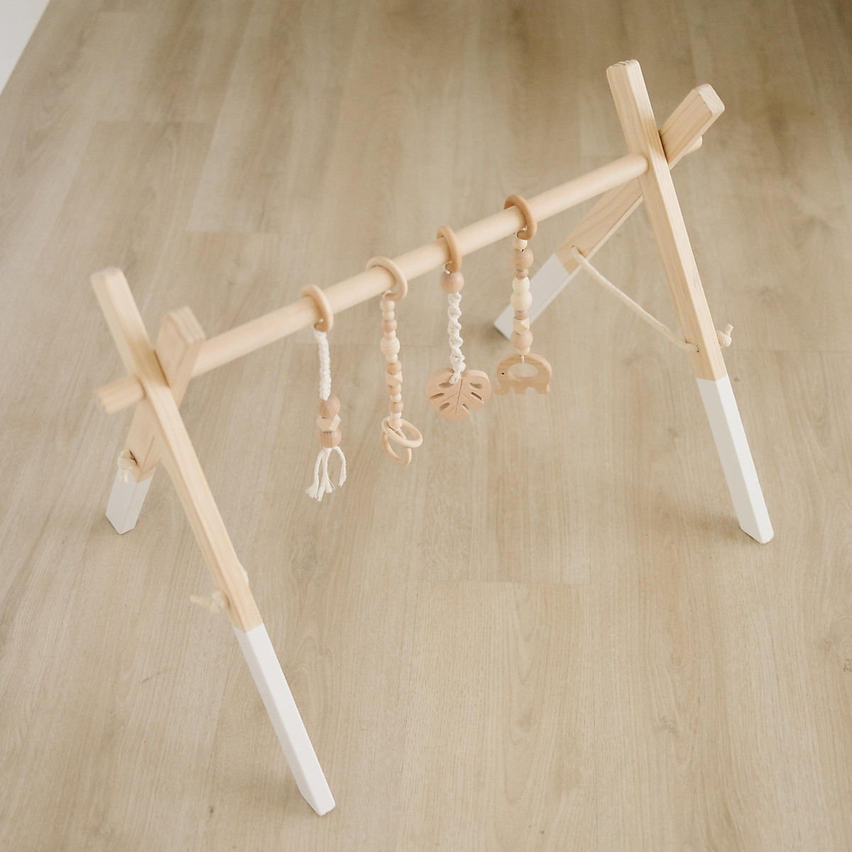 Poppyseed Play Wooden Baby Play Gym, Foldable Frame w/Hanging Bar, Tied Cotton Cord & Wooden Toys, Gender Neutral Baby Activity Set, Easy to Assemble (White Wood, Macrame Toys)