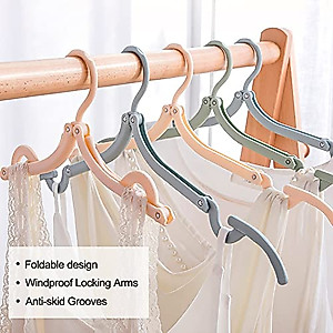 16pcs Colorful Travel Hangers, XIACIBDUS Portable Folding Plastic Hangers with 1 Clothesline, Travel Accessories Clothes Drying Rack for Travel School Home