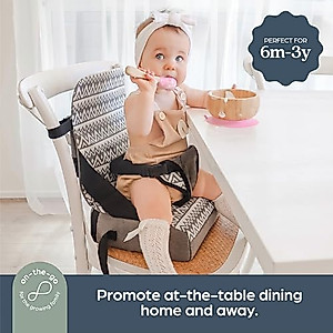 Dreambaby Grab ‘N Go Travel Booster Seat with Built-in Storage Space, Portable Highchair Booster Seat for Tables, High-Back Seat and Foldable for Baby Travel, Secured with a 3-Point Harness, Grey