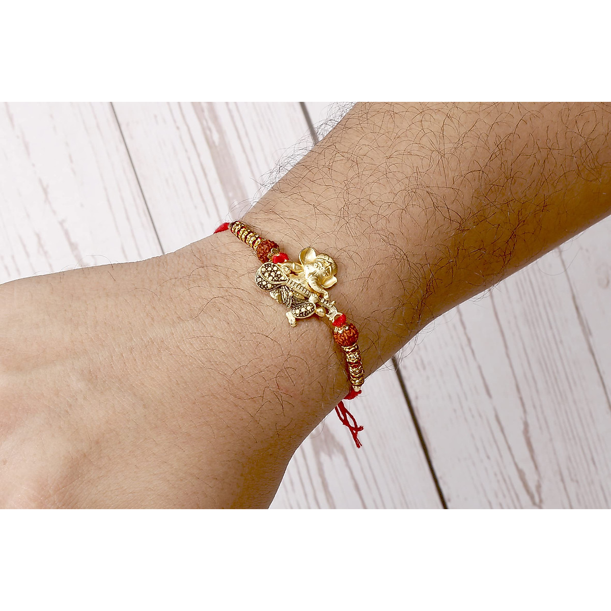 ARTISENIA Majestic Ganesha Playing Veena Rakhi for Brother Raksha Bandhan Rakhi Thread Bracelet Wrist bands for Loving Brother Sister