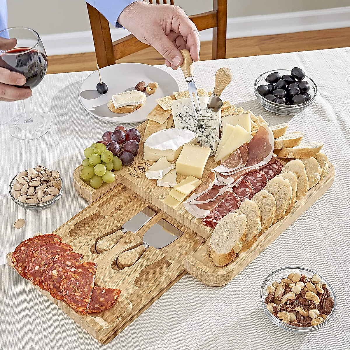 Premium Bamboo Cheese Board and Knife Set - Charcuterie Board with Knives - Deep Grooves & Hidden Drawer for Stainless Steel Cutlery - Wine Cheese Board Set - an Elegant Gift Idea