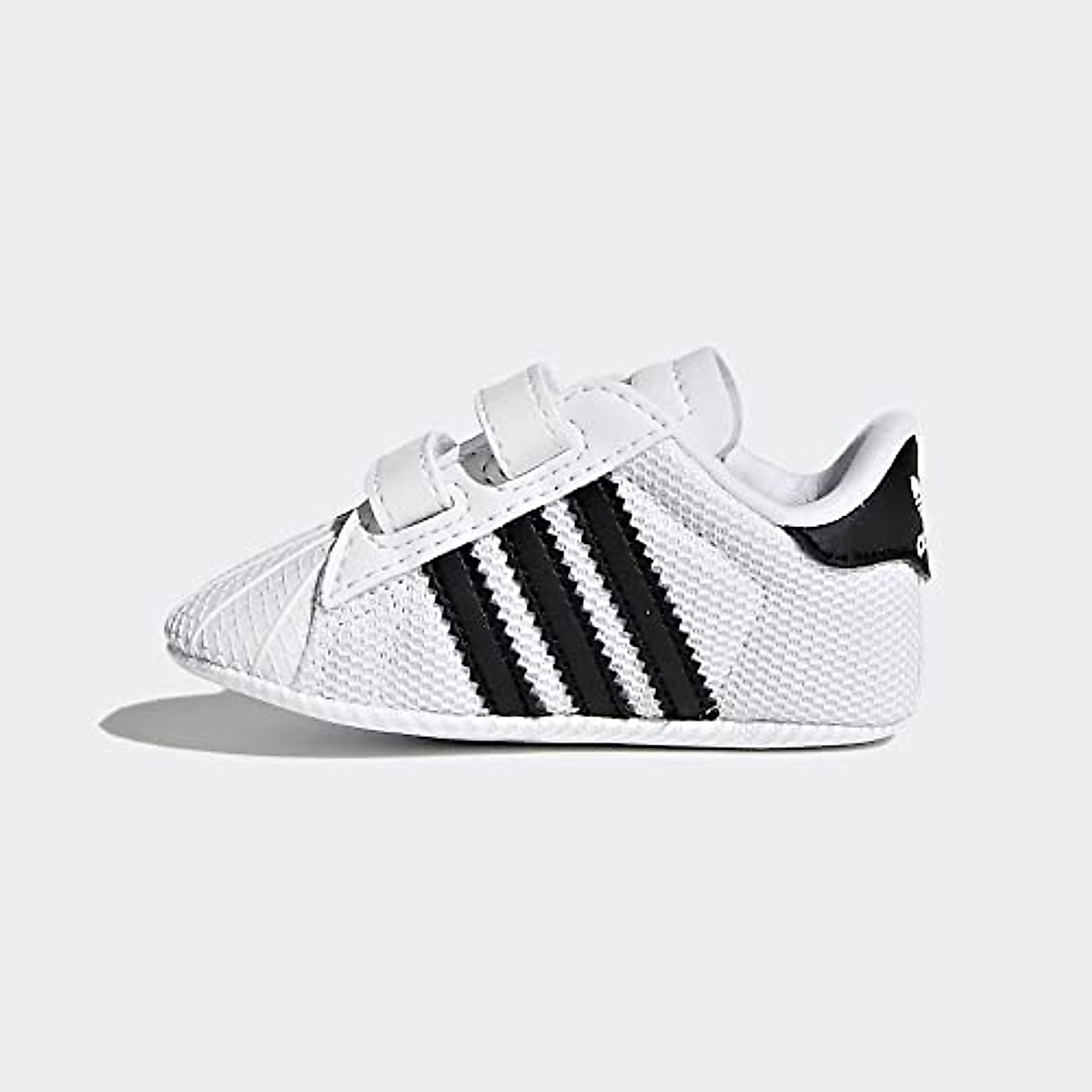 adidas Originals unisex child Superstar Sneaker, Core White/Black/White, 4 Toddler US