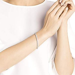 Swarovski Tennis Deluxe Collection Women's Tennis Bracelet, Sparkling Clear Crystals with Rhodium Plated Band