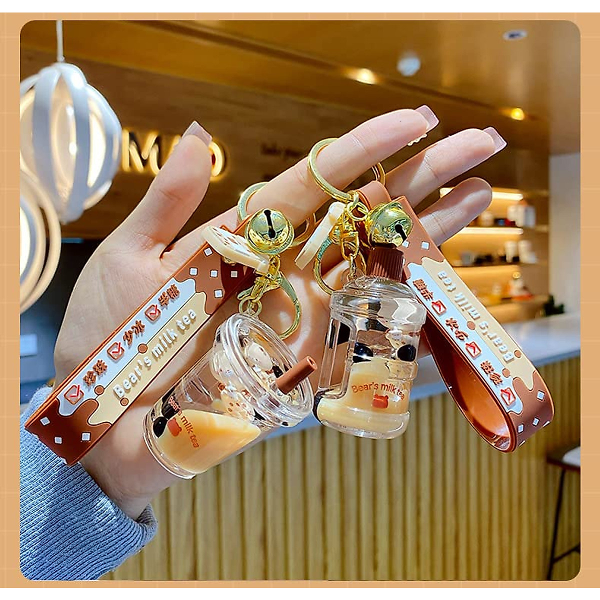 HSYHERE Men Women Creative Interesting Floating Milk Tea Brown Bear Lucky Bottle Keychain Keyrings, Bubble Moving Liquid Sand Car Chain Key Ring Bag Pendant Key Holder -Water Bottle