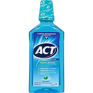 ACT Restoring Fluoride Mouthwash 33.8 fl. oz. Strengthens Tooth Enamel, Cool Mint