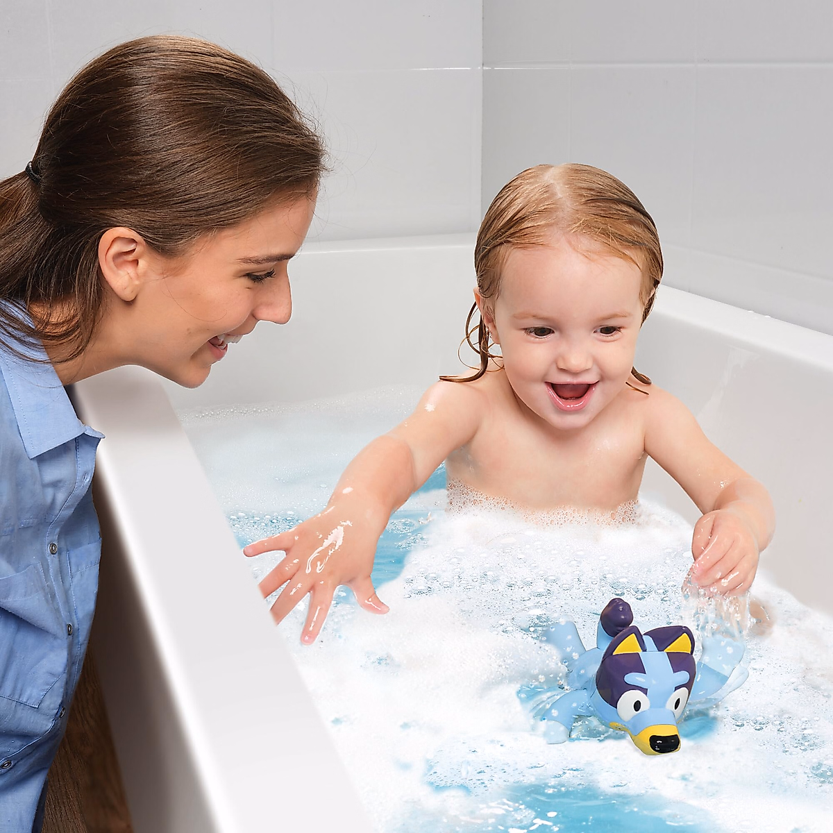 TOMY Toomies Bluey Swimming Bath Toy - Bluey Toys Includes Attached Seahorse Baby Toy and Swims on Back or Front - Toddler Bath Toys and Water Toys for Outdoor Play – Ages 18 Months and Up
