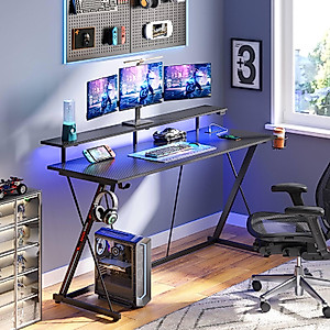 SEVEN WARRIOR Gaming Desk with LED Lights & Power Outlets, 55" Computer Desk with Monitor Shelf, Home Office Desk with Cup Holder and Headphone Hook, Ergonomic, Carbon Fiber Surface Black