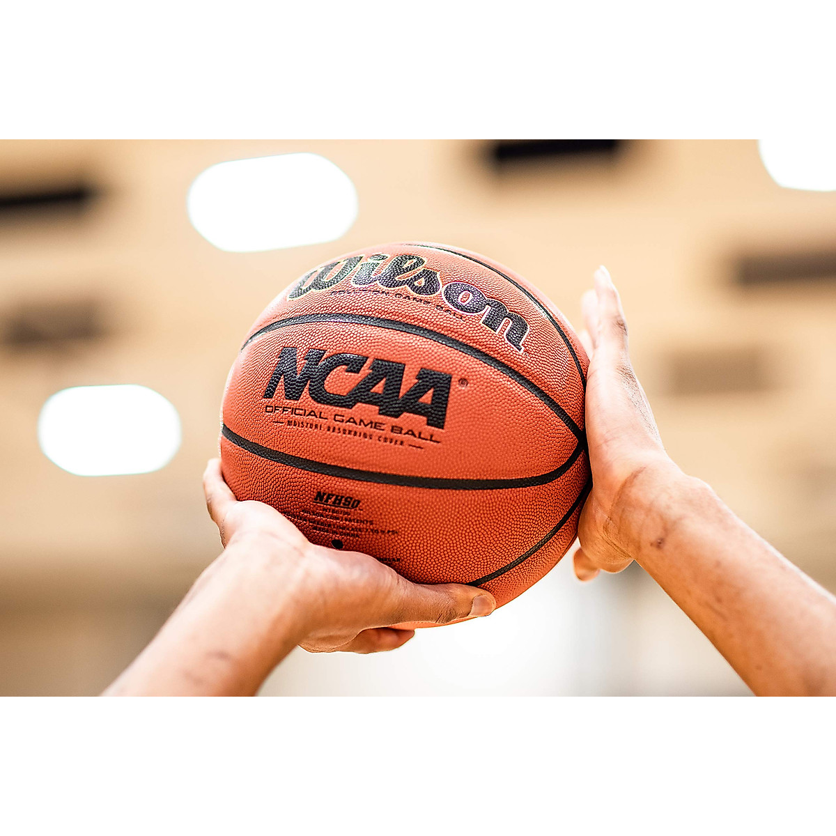 WILSON Sporting Goods NCAA Official Game Basketball, Intermediate - 28.5", Orange (1B0701R)