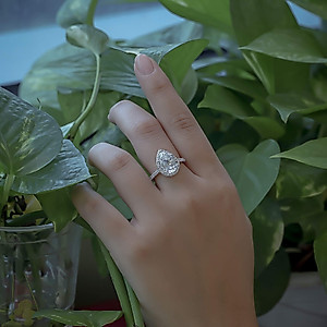 DIAMONBLISS Platinum Clad Sterling Silver Cubic Zirconia 100-Facet Pear Cut Ring (5)