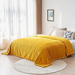 DISSA Fleece Blanket Throw Size – 51x63, Yellow – Soft, Plush, Fluffy, Fuzzy, Warm, Cozy – Perfect Throw for Couch, Bed, Sofa - with Pompom Fringe - Flannel Blanket Throw Blanket