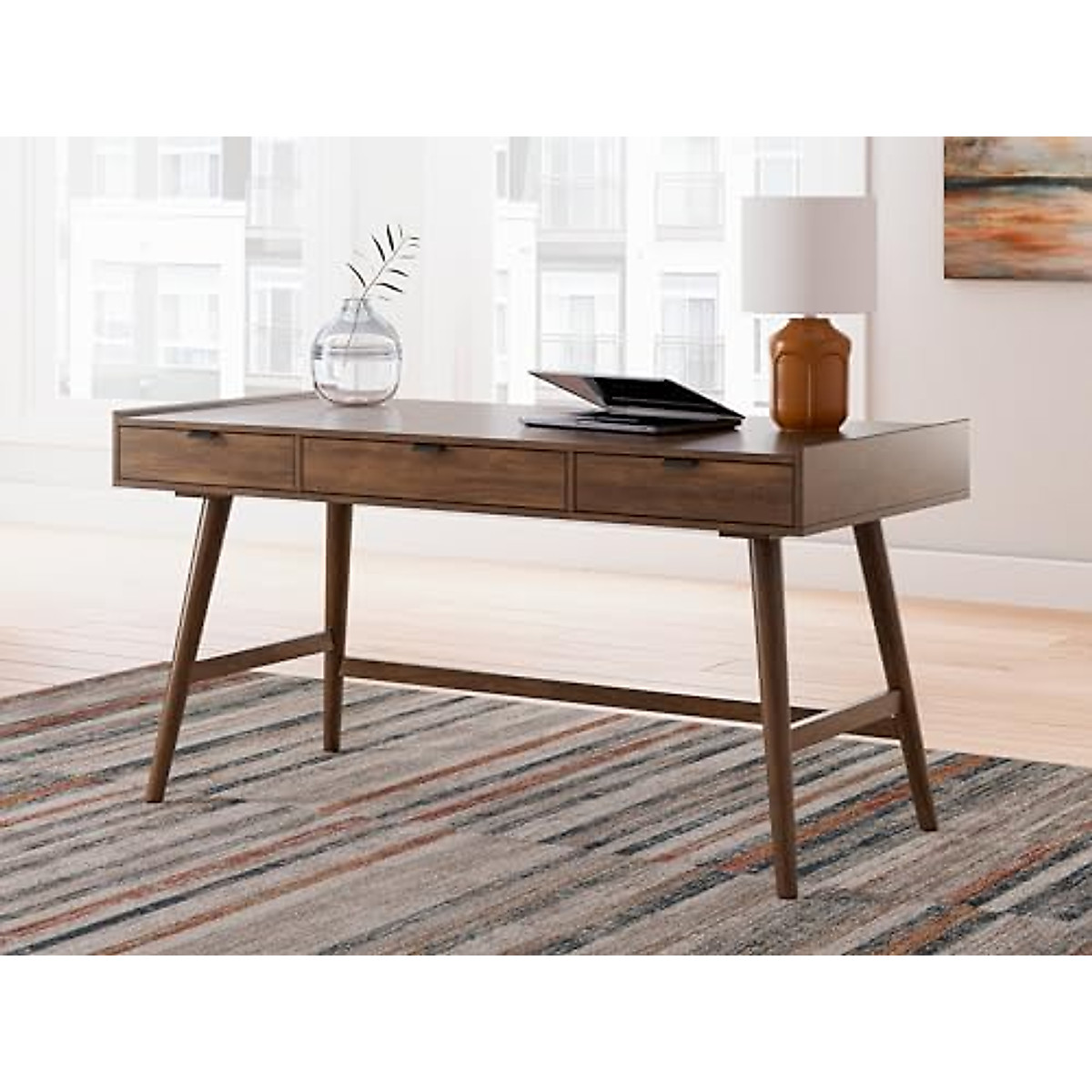 Signature Design by Ashley Lyncott Mid Century 3-Drawer 60" Home Office Desk with Cord Management, Open Cubby and Tapered Legs, Dark Brown