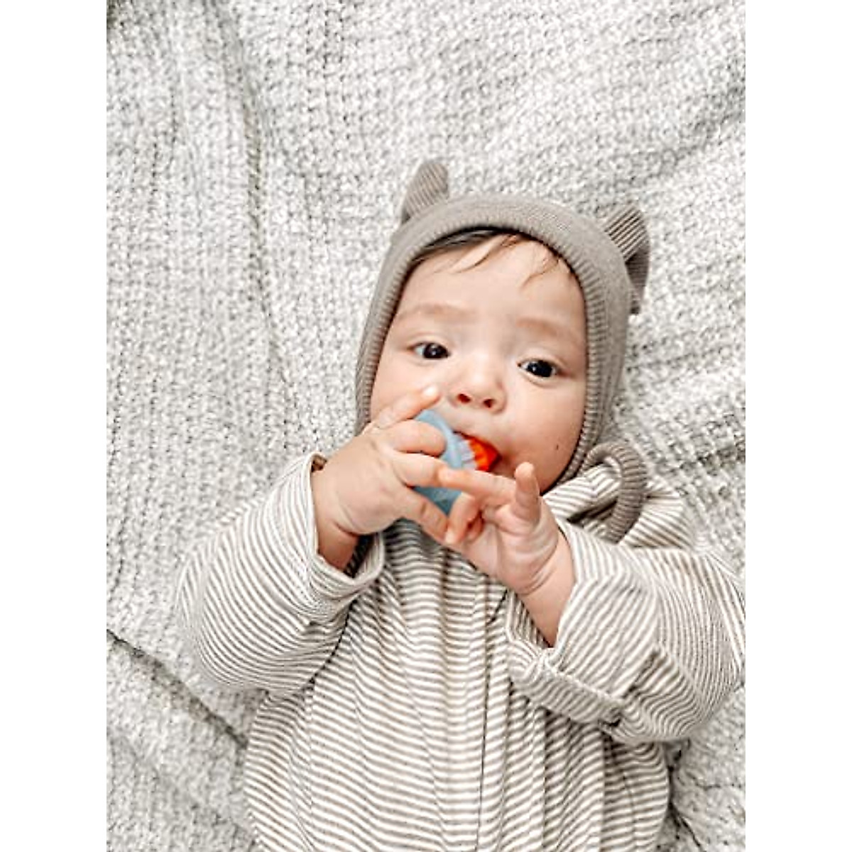 Itzy Ritzy Teensy Teether - Soothing Silicone Hollow Teether Features Flexible, Easy-to-Hold Handle, Hero Pop