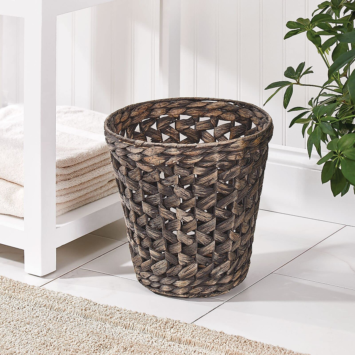 mDesign Water Hyacinth Waste Basket Boho Woven Trash Can - Small Round Natural Wastebasket Garbage Bin for Bathroom Essentials - Woven Zig Zag Pattern - Black Wash