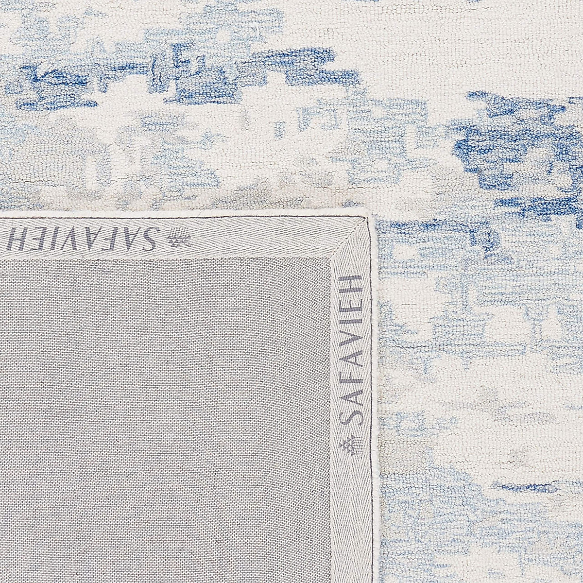 SAFAVIEH Abstract Collection Area Rug - 8' x 10', Ivory & Blue, Handmade Abstract Wool, Ideal for High Traffic Areas in Living Room, Bedroom (ABT465A)