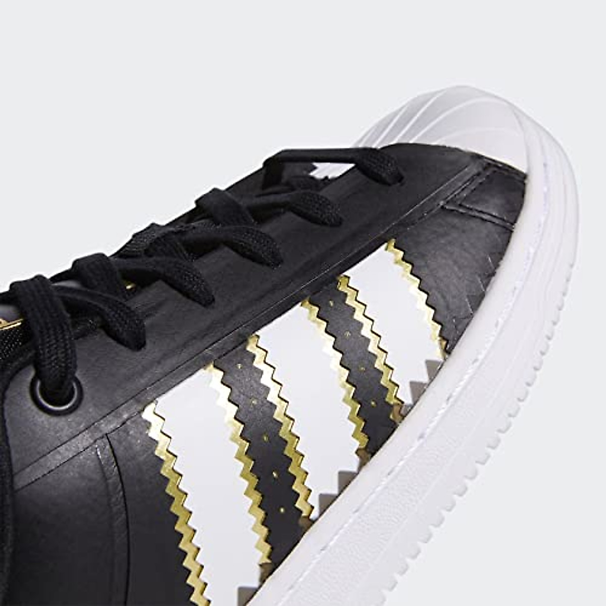 adidas Originals Women's Rich Mnisi Surperstar Ot Tech Low Shoes, Casual Leather Sneakers, Core Black/Cloud White/Gold Metallic, 9.5