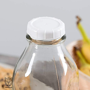 The Bar Glass Vintage Clear Glass Milk Juice Water Bottle with Lid 33.5 oz. (1)