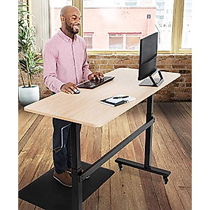 Stand Steady Tranzendesk | 55 Inch Standing Desk with Detachable Wheels | Crank Height Adjustable Sit to Stand Workstation | Modern Ergonomic Desk Supports 3 Monitors  (Maple)