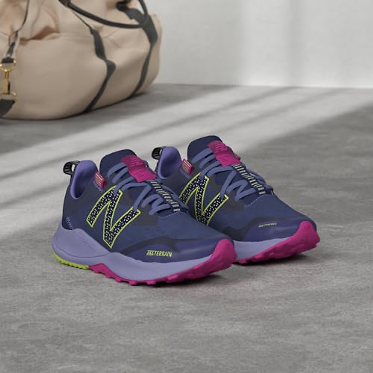 New Balance Women's Dynasoft Nitrel V4 Trail Running Shoe, Blue/Yellow/Pink, 10