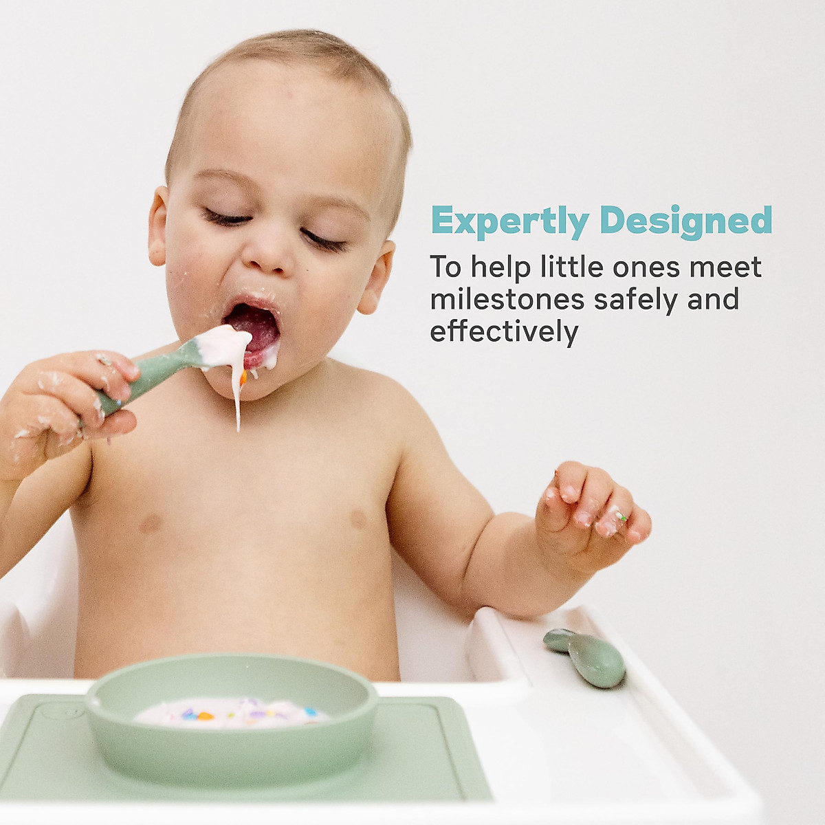 ezpz Mini Bowl for 12 Months+ (Sage) - 100% Silicone Suction Bowl with Built-in Placemat for Toddlers - Comes with a Reusable Travel Bag