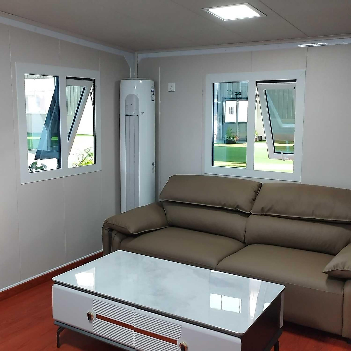 Mobile prefab Expandable Tiny Houses for Families with Restroom, Outdoor Storage. Sturdy Steel and Plastic. Suitable for Various Purposes Like Hotels, Offices etc. (19ft x 20ft)