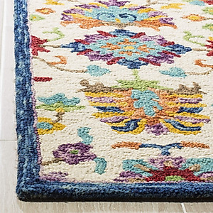 SAFAVIEH Aspen Collection Accent Rug - 2'3" x 5', Ivory & Blue, Handmade Boho Floral Wool, Ideal for High Traffic Areas in Entryway, Living Room, Bedroom (APN509A)