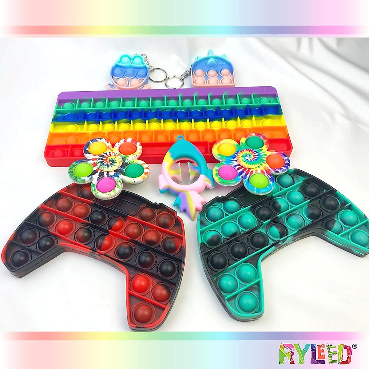 RYLEED 8 Pack Pops Fidget Toys, It is Includes( 2 Game Controller Gamepad Shape+ 2 Small Poppit Keychain+ 2 Fidget Spinner Toys+ 1 Keyboard Shape+ 1 Rocket Shape Snap Toy)