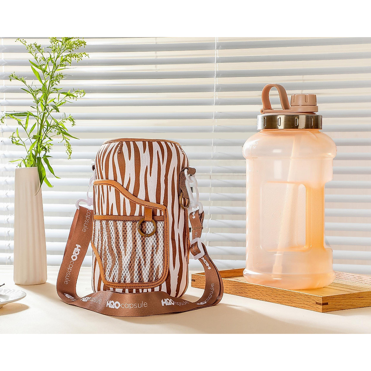 H2O Capsule 2.2L Half Gallon Wide Mouth Water Bottle with Storage Sleeve and Removable Straw - Hydration Tracker Jug with Measurements Marked – Shatterproof BPA-Free, (Libra Zebra)