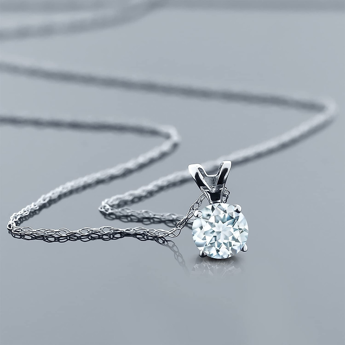 Gem Stone King 14K White Gold Sky Blue Aquamarine Solitaire Pendant Necklace For Women (0.25 Cttw, Gemstone March Birthstone, Round 4MM, with 18 inch Chain)