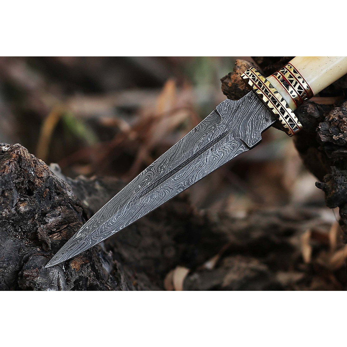 12.5 Inch long Hunting knife, Collectible knife, Natural Camel bone scale embellished with engraved brass finger guard, foil work spacer and pommel, Hand forged Twist pattern Damascus steel blade, Comes with Leather sheath