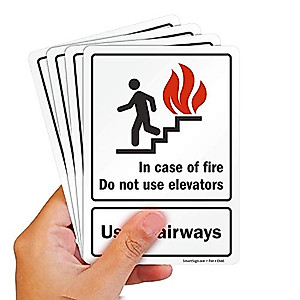 SmartSign (Pack of 4) 7 x 5 inch “in Case of Fire Do Not Use Elevators, Use Stairways” Sticker Labels with Symbol, 5 mil Laminated Polyester with SuperStick Adhesive, Red, Black and White