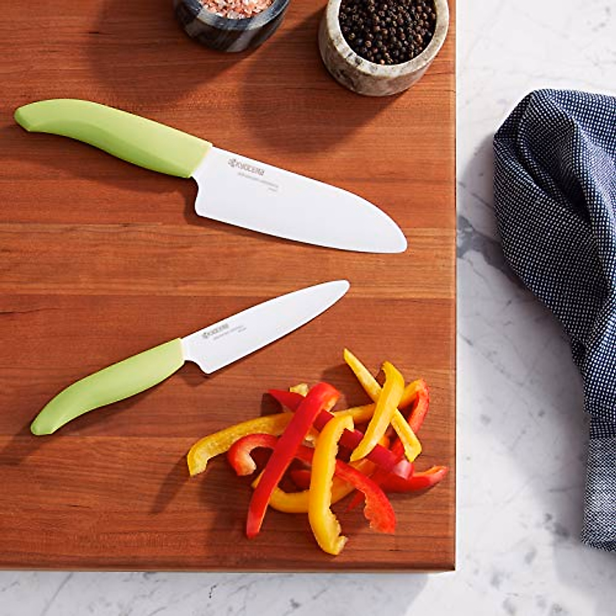 Kyocera Revolution 2-Piece Ceramic Knife Set: Chef Knife For Your Cooking Needs, 5.5" Santoku and 4.5" Utility Knife, White Blades with Green Handles, White/Green
