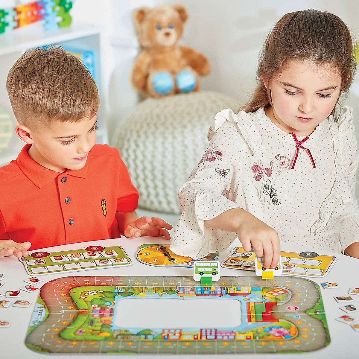 Orchard Toys Moose Games Bus Stop Game. A Fun Introduction to Addition and Subtraction. Pick up and Drop Off Passengers on Your Bus. for Ages 4-8 and for 2-4 Players