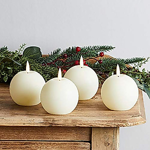 Lights4fun, Inc. Set of 4 TruGlow Ivory Distressed Wax Flameless LED Battery Operated Sphere Candles with Remote Control