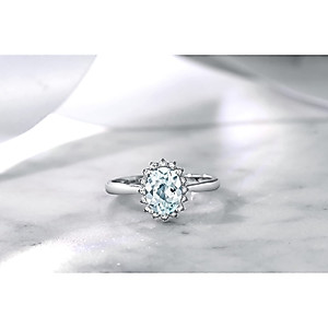 Gem Stone King 10K White Gold Sky Blue Aquamarine and Diamond Halo Engagement Ring For Women (1.25 Cttw, Oval 8X6MM, Size 9)