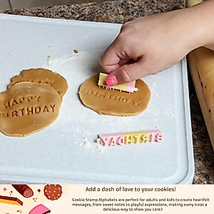 Home-X Cookie Stamps Fondant Letter Stamps - Alphabet, Numbers & Symbols, DIY Fondant Embosser for Cookie & Cake Decorating - 96 Pieces Letter Stamps for Clay with Storage Bag - Pink & Yellow