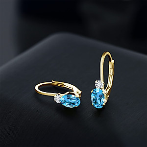 Gem Stone King 14K Yellow Gold Swiss Blue Topaz and White Diamond Leverback Earrings For Women | 1.07 Cttw | Gemstone November Birthstone | Oval 6X4MM, Round 2MM | 3/4 Inch