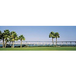 Posterazzi Palm trees on the coast background Coronado Bay Bridge San Diego County California USA Poster Print, (18 x 6)