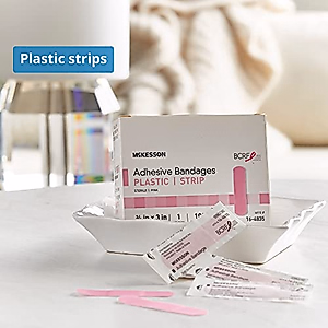 McKesson Adhesive Bandages, Sterile, Fabric Strip, Pink, 3/4 in x 3 in, 100 Count, 1 Pack