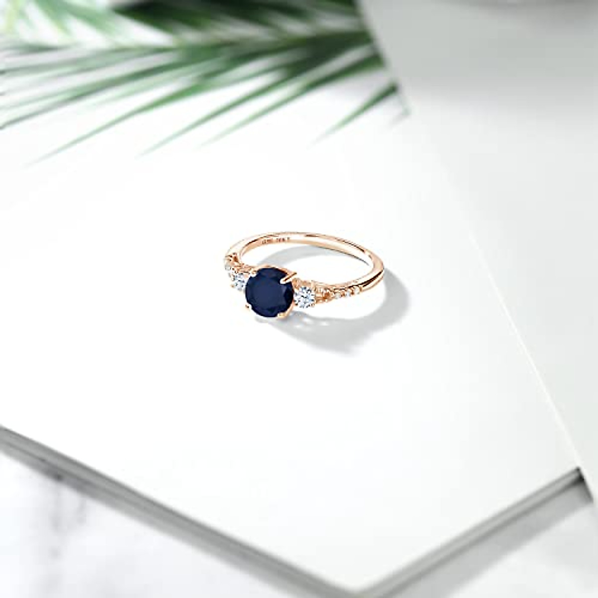 Gem Stone King 10K Rose Gold 6MM Round Gemstone Birthstone White Created Sapphire and White Diamond Accent 3-Stone Engagement Ring | Three-Stone Wedding Anniversary Promise Ring For Women