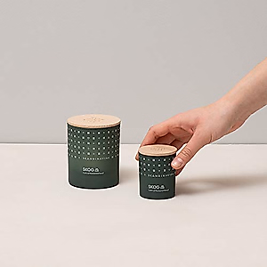 Skandinavisk Skog 'Forest' Scented Candle. Fragrance Notes: Pine Needles and Fir Cones, Birch Sap and Lily of The Valley. 7.0 oz.