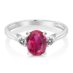 Gem Stone King 10K White Gold Oval Red Created Ruby and White Diamond Engagement Ring For Women (1.63 Cttw, Available In Size 5, 6, 7, 8, 9)
