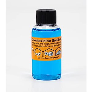 Carolina Custom Cages' Chlorhexidine Solution 2%; 1 Refill Makes 32 oz Working Solution Bundle with Zoo Med ReptiTherm Habitat Heater 40w RH-20, 18x18, for Heavy Tortoises & Other Large Reptiles