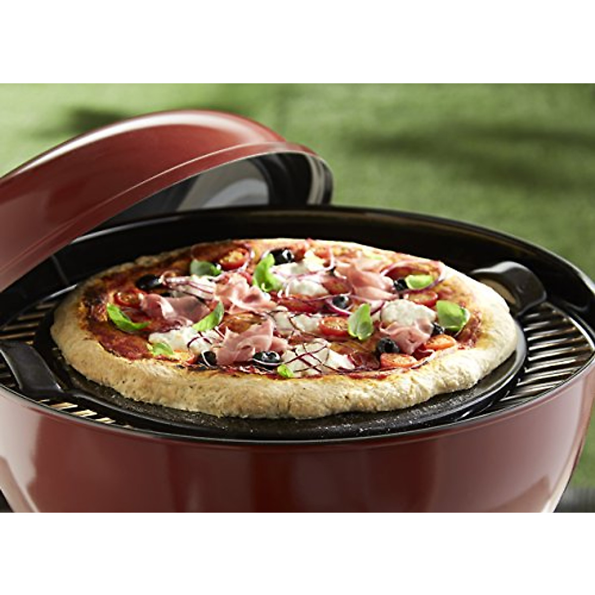 Emile Henry Made in France Flame Top Pizza Stone, Black. Perfect for Pizzas or Breads. In the Oven, On Top of the BBQ. Safe up to 750 degrees F. 100% Natural Clay, Glazed Surface. Easy to Clean.