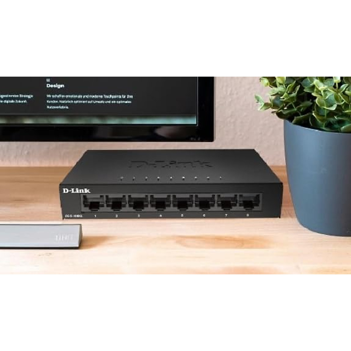 D-Link Ethernet Switch, 8 Port Gigabit Unmanaged Desktop Plug and Play Sturdy Metal Housing Fanless Design EEE Brown Box (DGS-108GL)