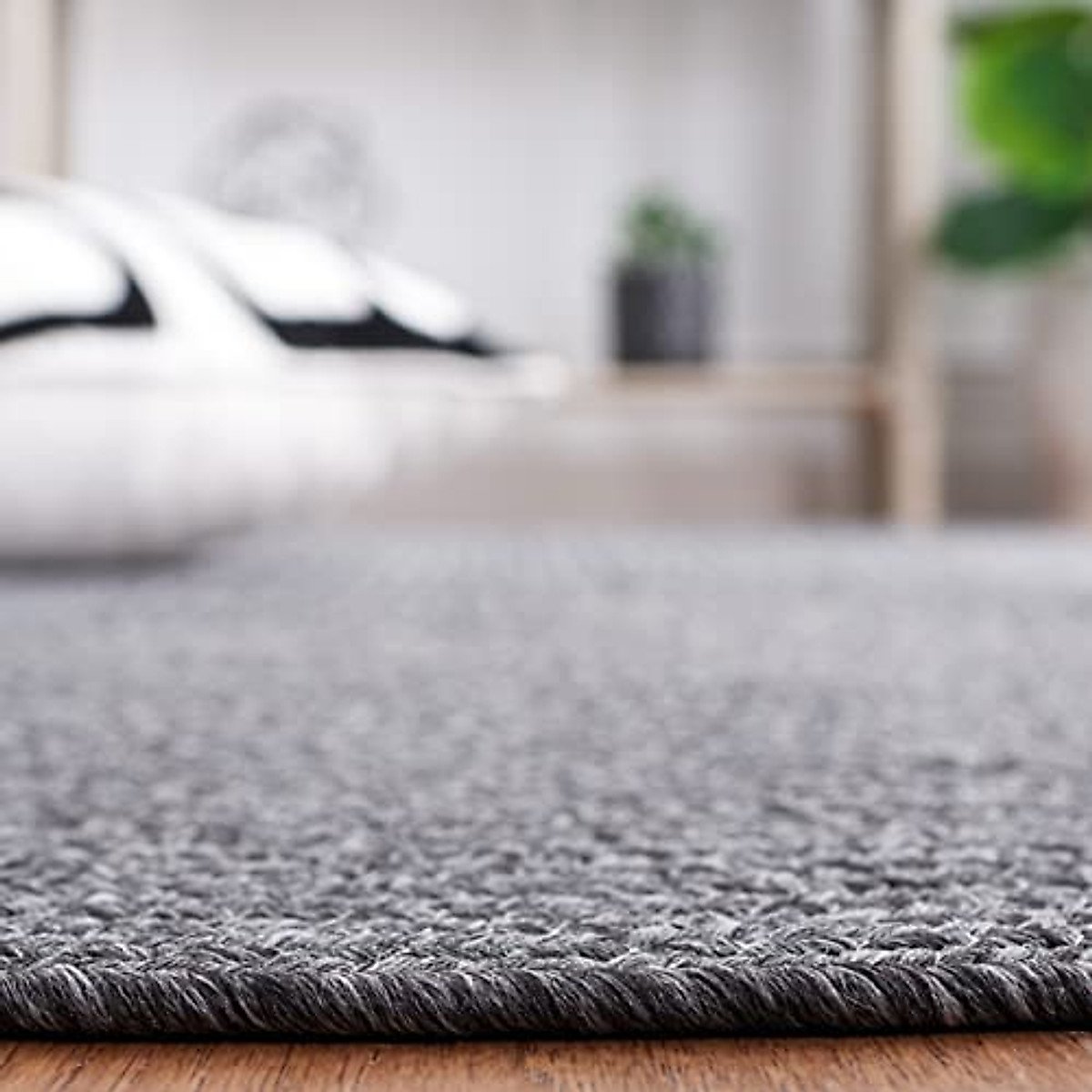 SAFAVIEH Braided Collection Area Rug - 9' x 12', Black, Handmade Farmhouse, Ideal for High Traffic Areas in Living Room, Bedroom (BRA201Z)