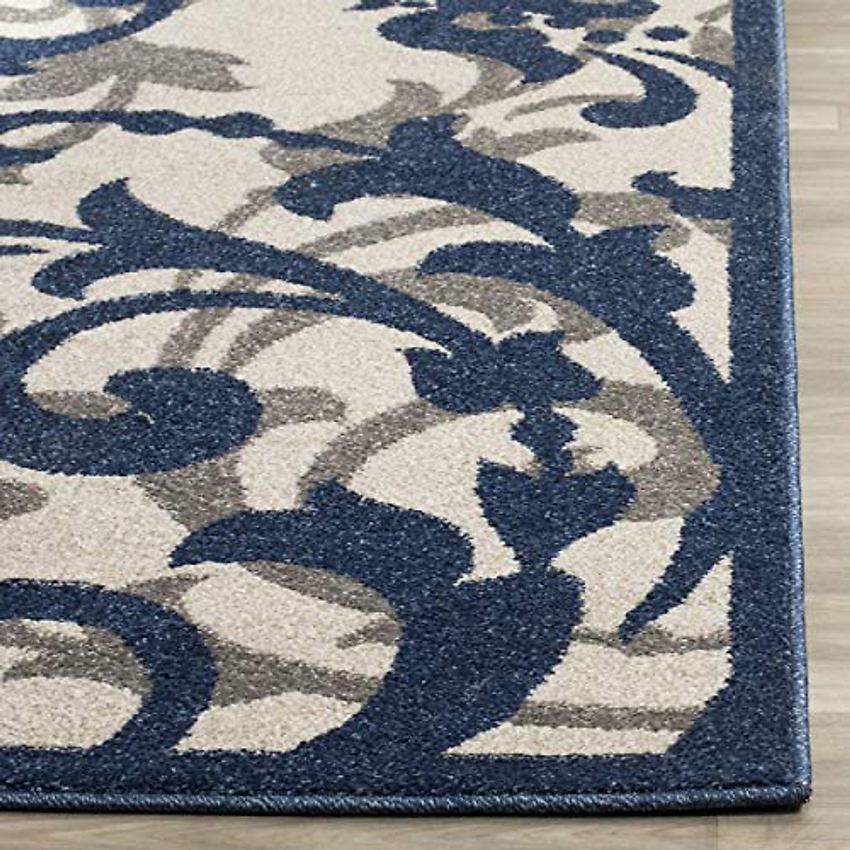 SAFAVIEH Amherst Collection Area Rug - 5'3" x 8', Ivory & Navy, Floral Scroll Design, Non-Shedding & Easy Care, Ideal for High Traffic Areas in Living Room, Bedroom (AMT428M)